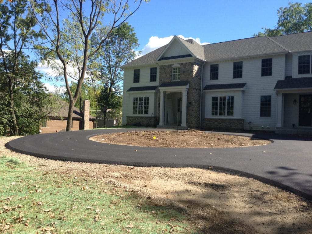 When to Repave Your Driveway: A Homeowner’s Guide - Parisi Paving & Sealing